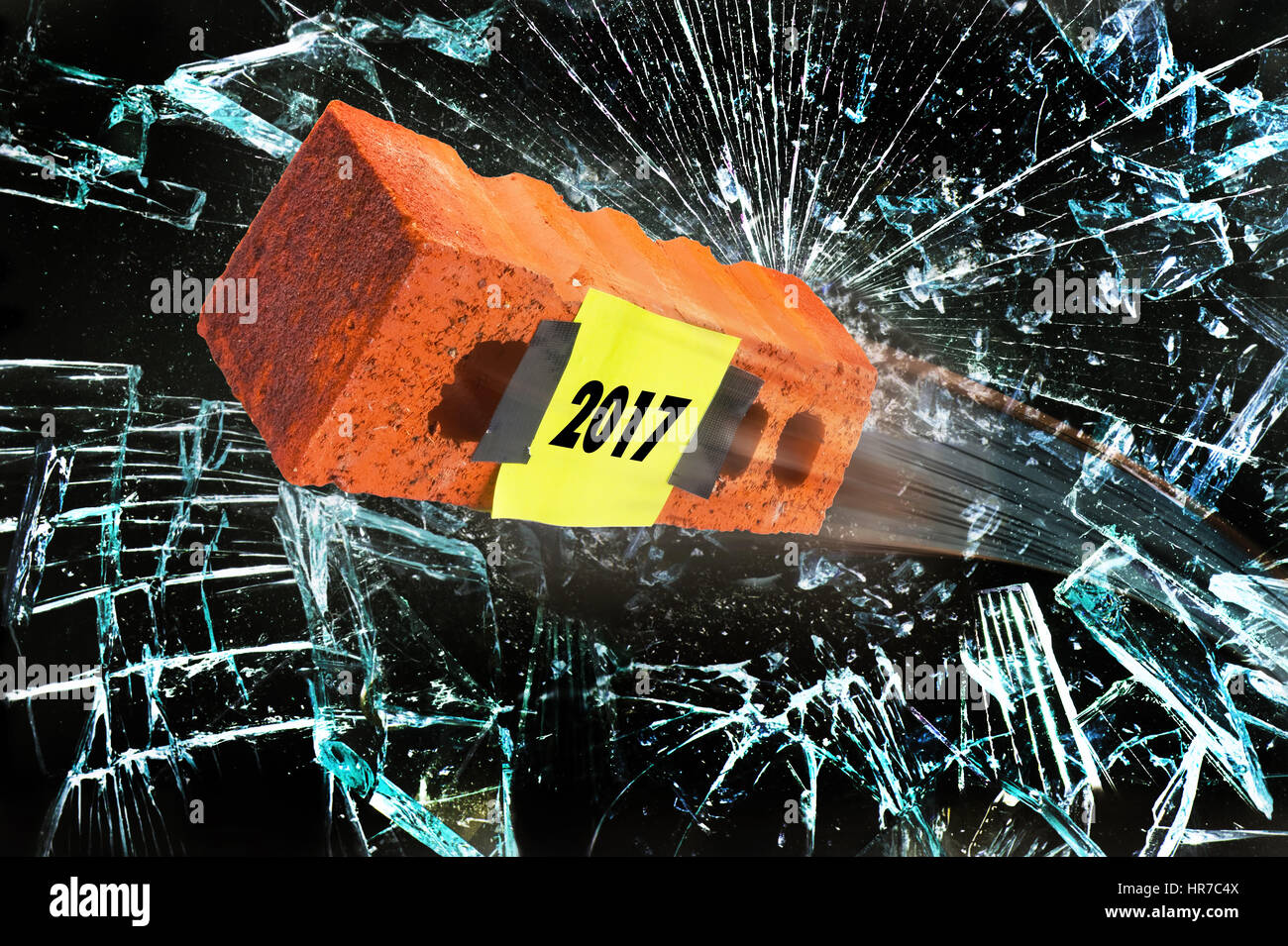 2017 year is like a brick flying through a broken window Stock Photo ...
