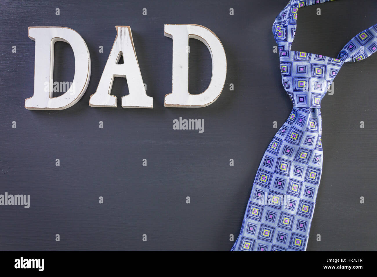 White letters DAD on a painted wood background Stock Photo - Alamy