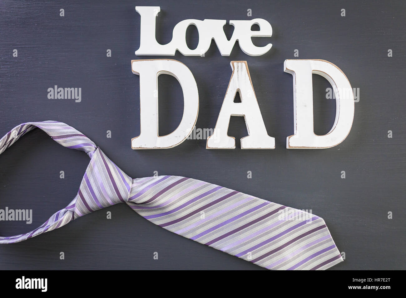White letters DAD on a painted wood background Stock Photo - Alamy