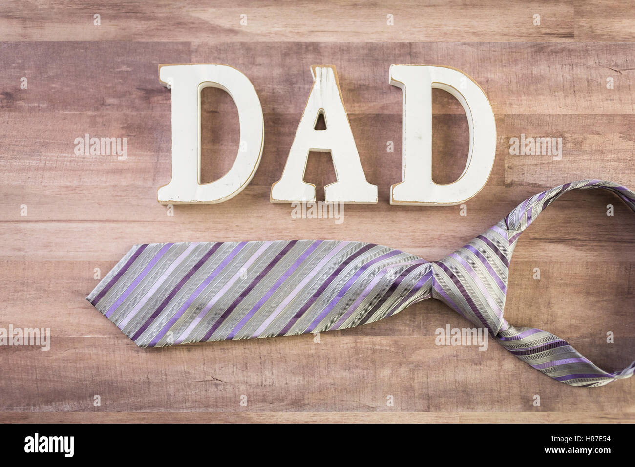 White letters DAD on a wood background Stock Photo - Alamy
