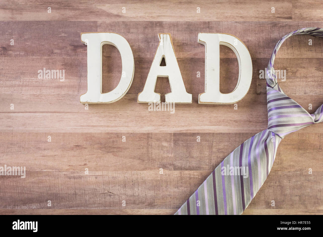 White letters DAD on a wood background Stock Photo - Alamy