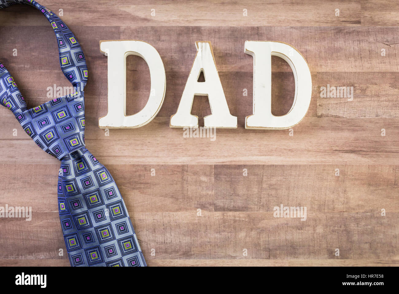 White letters DAD on a wood background Stock Photo - Alamy