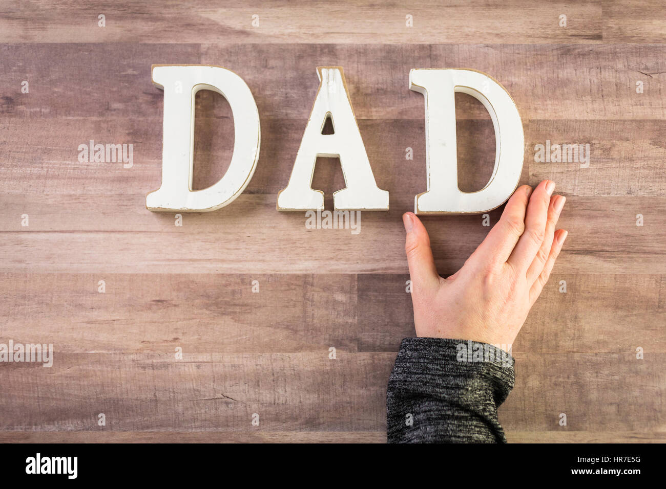 White letters DAD on a wood background Stock Photo - Alamy