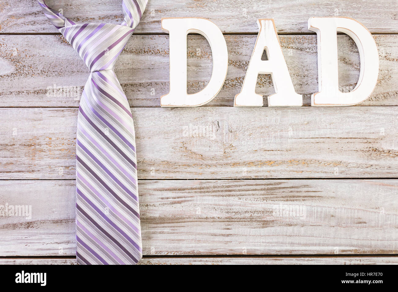 White letters DAD on a painted wood background Stock Photo - Alamy