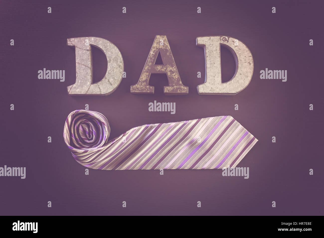 Metal letters DAD on a painted wood background Stock Photo - Alamy