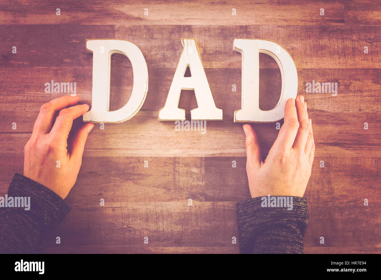 White letters DAD on a wood background Stock Photo - Alamy