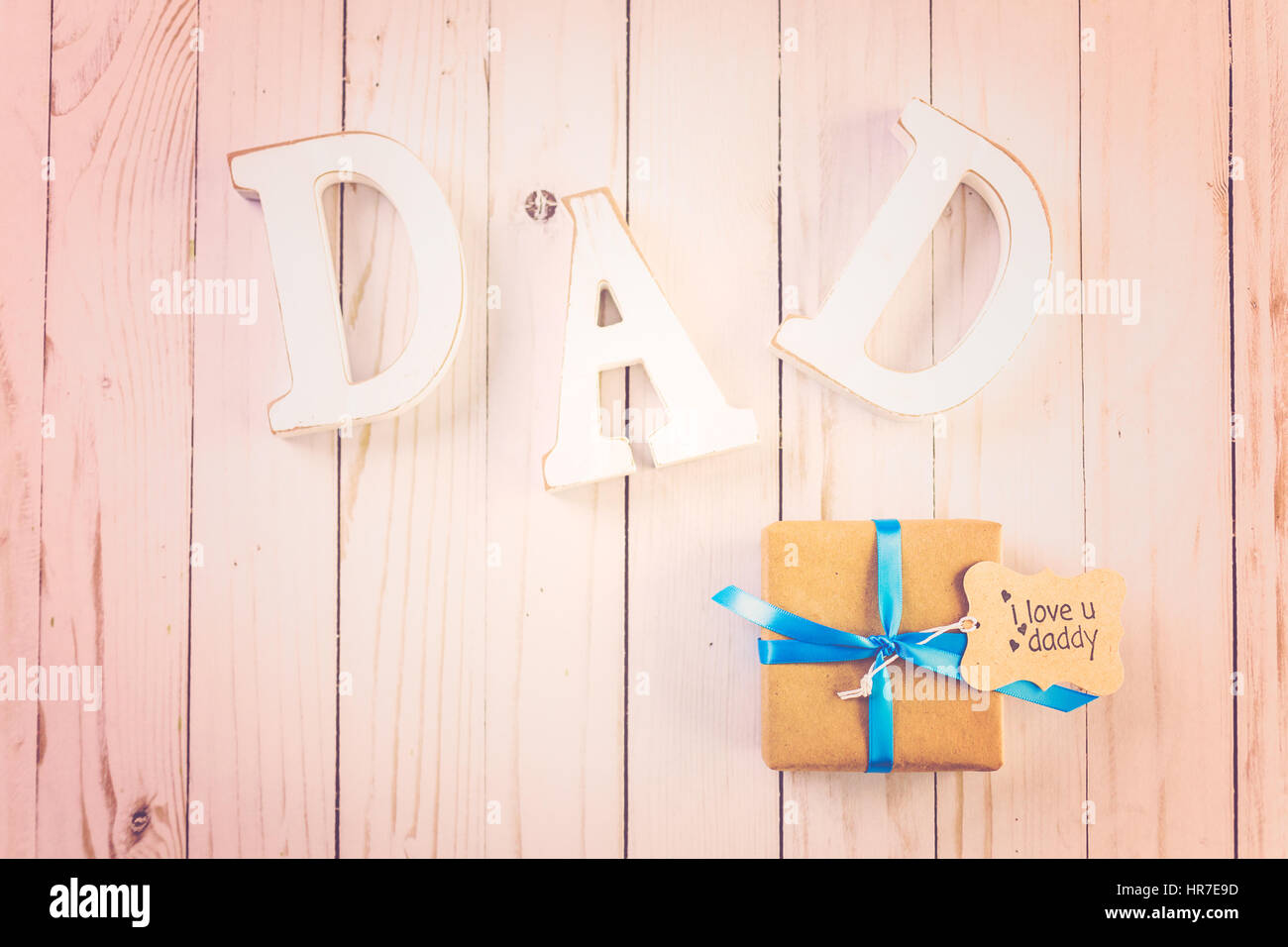 White letters DAD on a wood background Stock Photo - Alamy