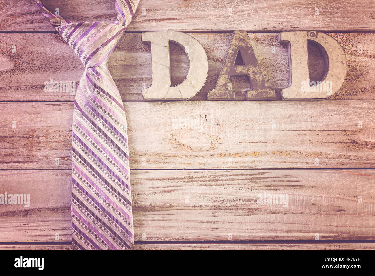 Metal letters DAD on a painted wood background Stock Photo - Alamy