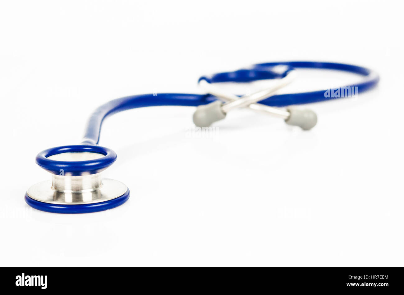 Blue stethoscope isolated on white background Stock Photo - Alamy
