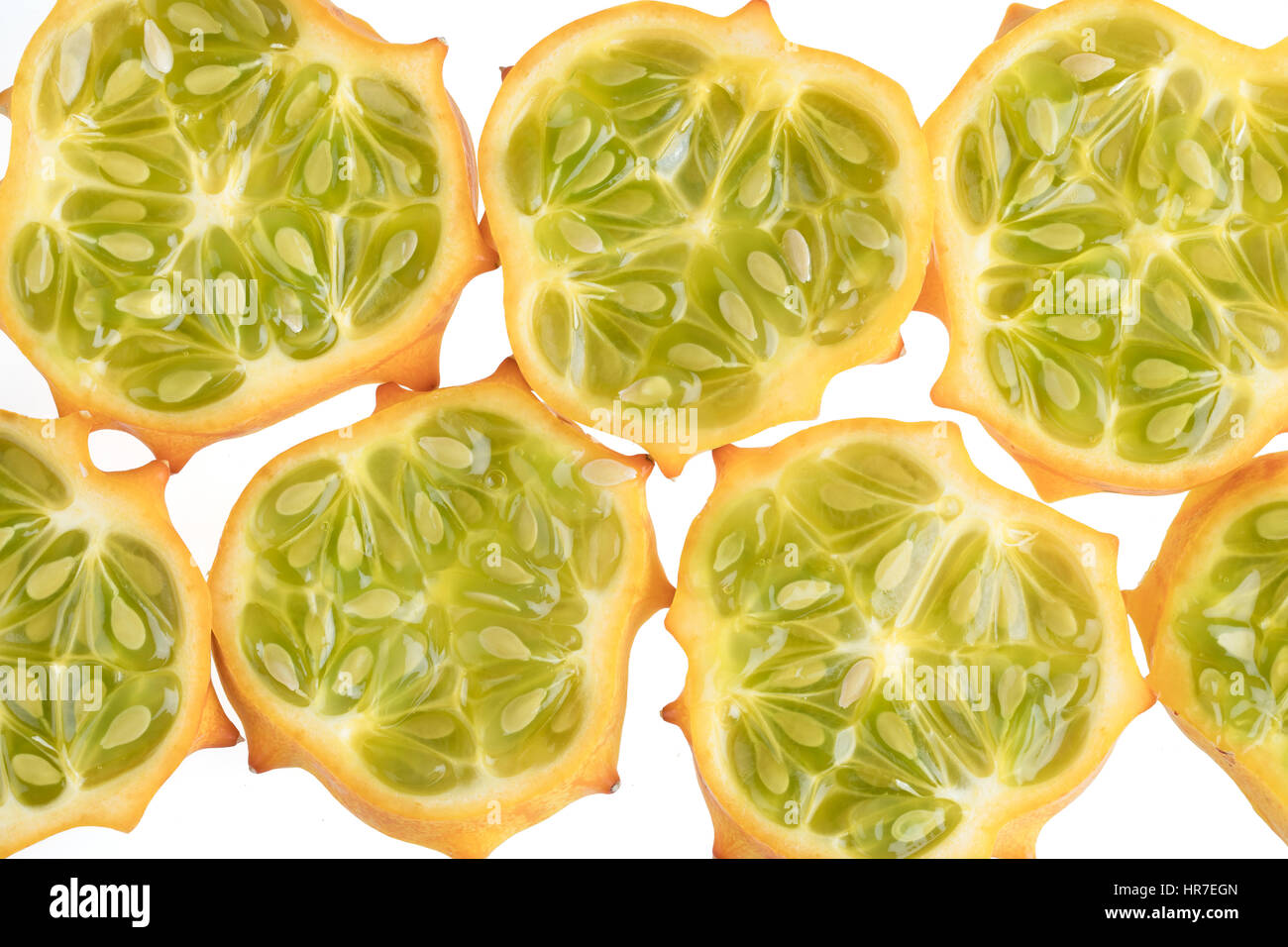 Several slices of kiwano fruit on white Stock Photo - Alamy