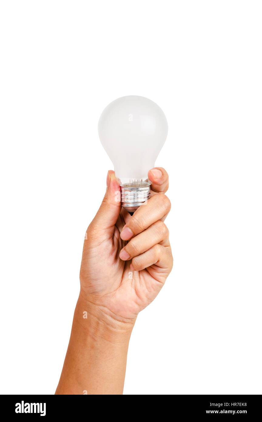 Hand holding an incandescent light bulb isolated on white background ...