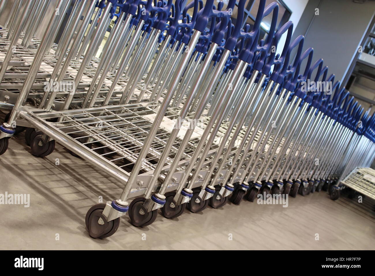 A row of carts in supermarket Stock Photo - Alamy
