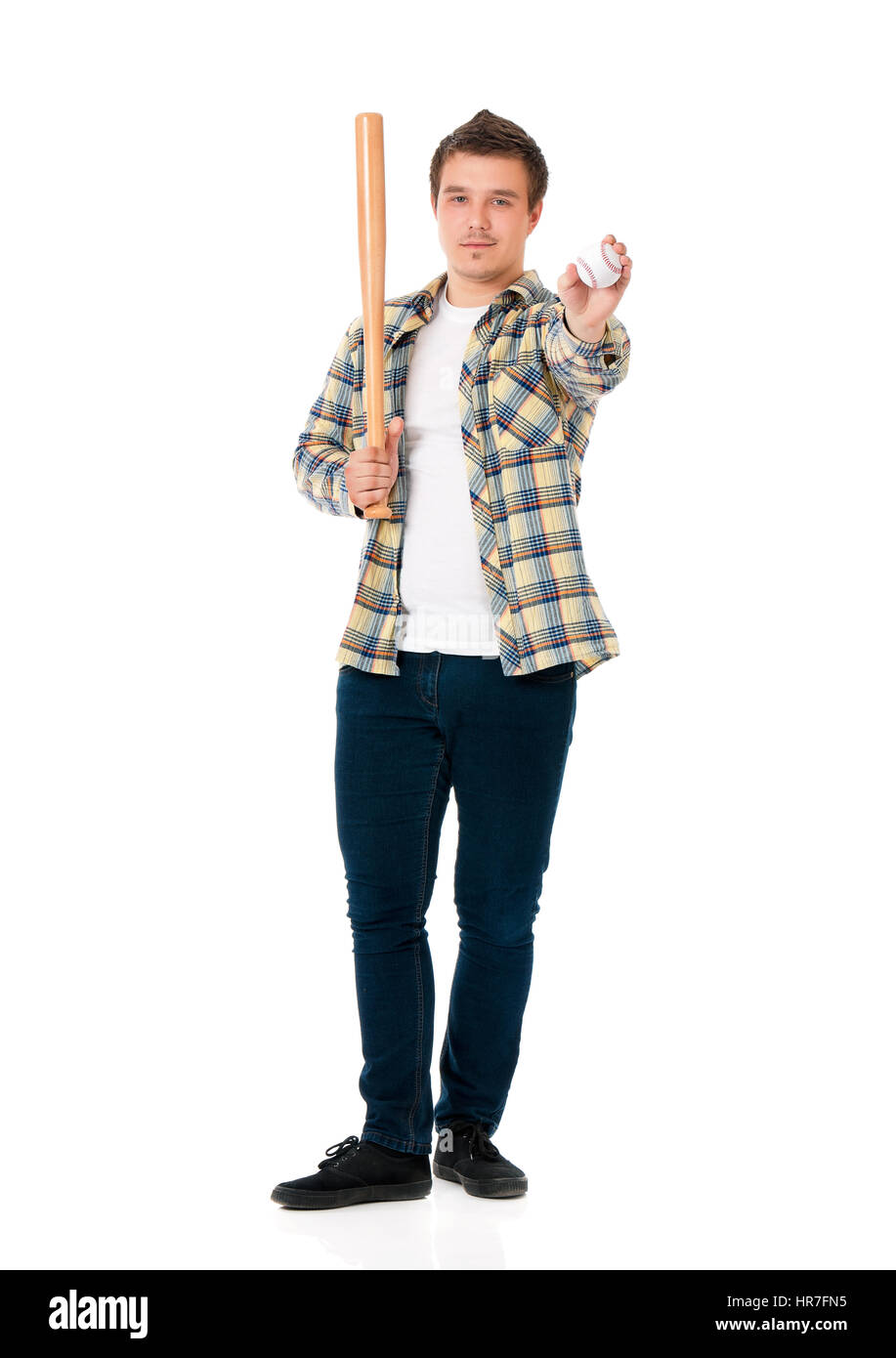 Young man with wooden baseball bat and ball. Guy standing full length ...