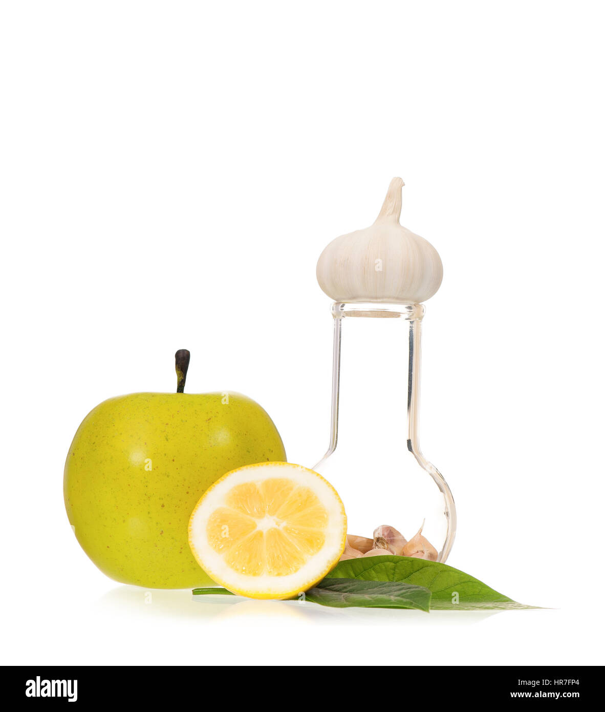 Test tubes with slice lemon and garlic, isolated on white background ...