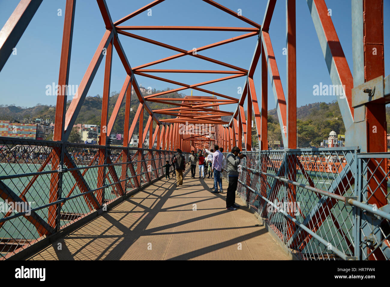 Indian people on the bridge at Haridwar, Uttarakhand,India Stock Photo ...