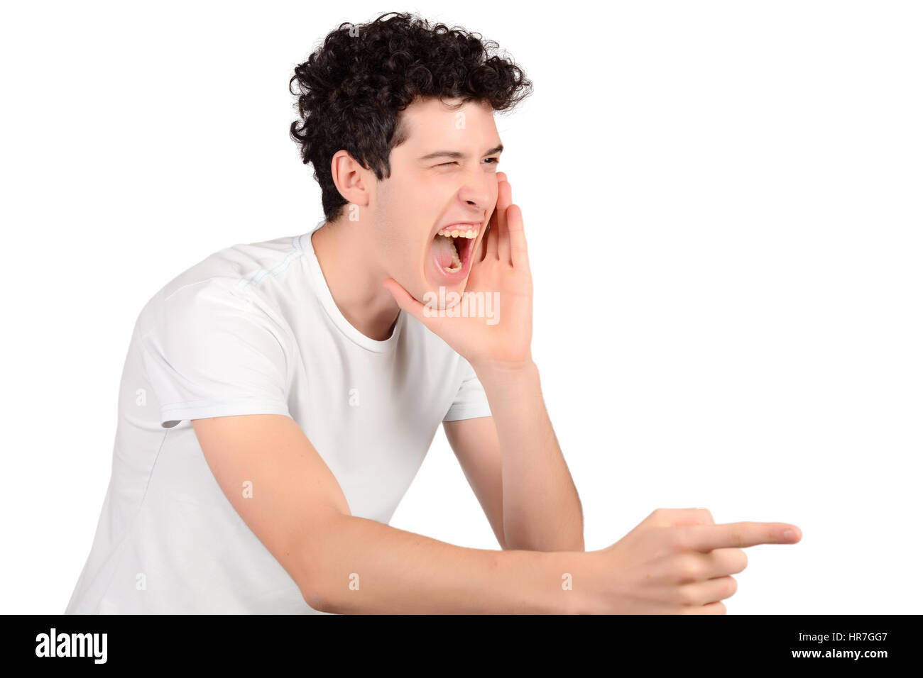 Portrait of a young man shouting. Isolated white background Stock Photo ...