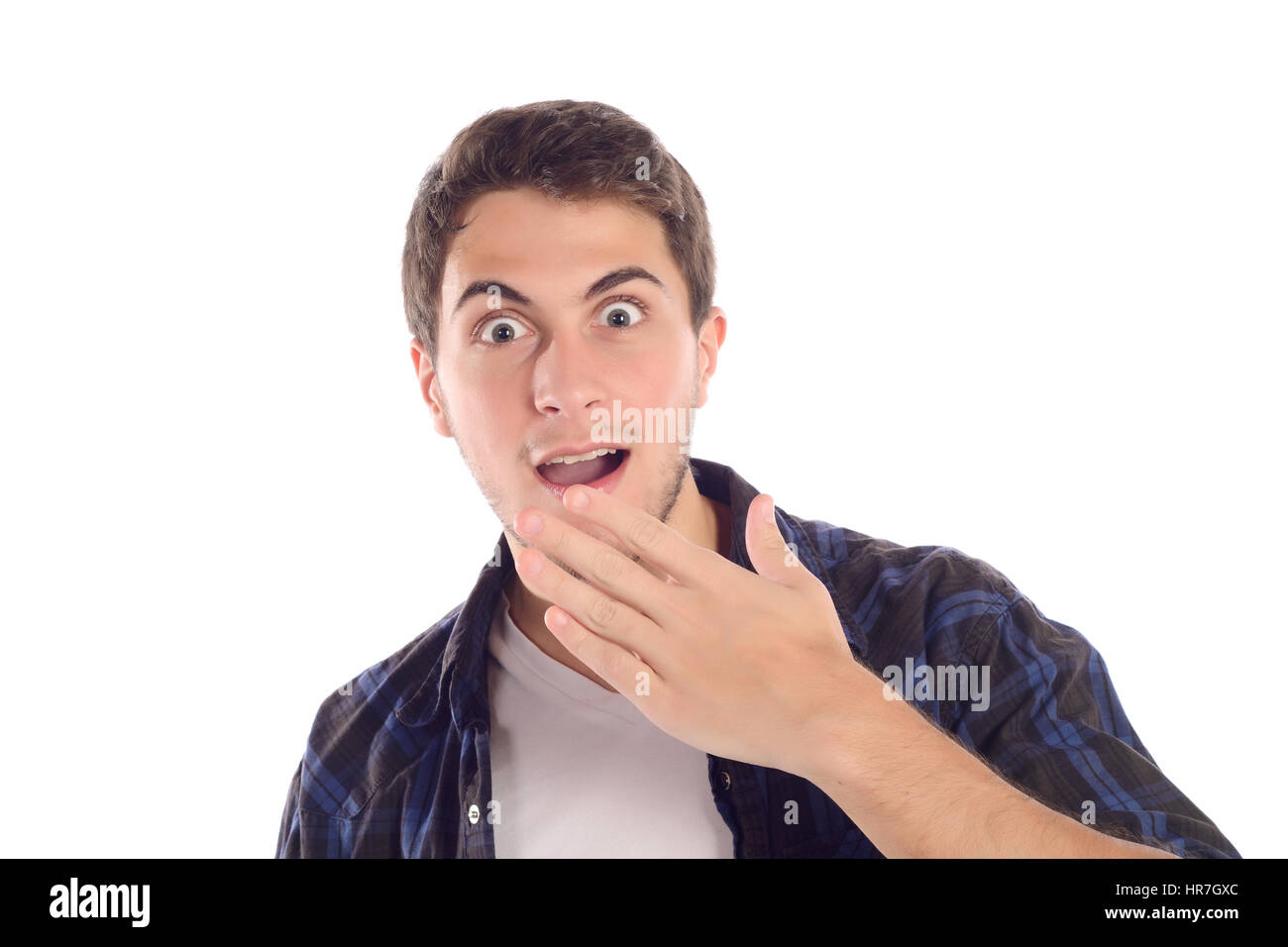 Portrait of a young amazed man. Isolated white background Stock Photo ...
