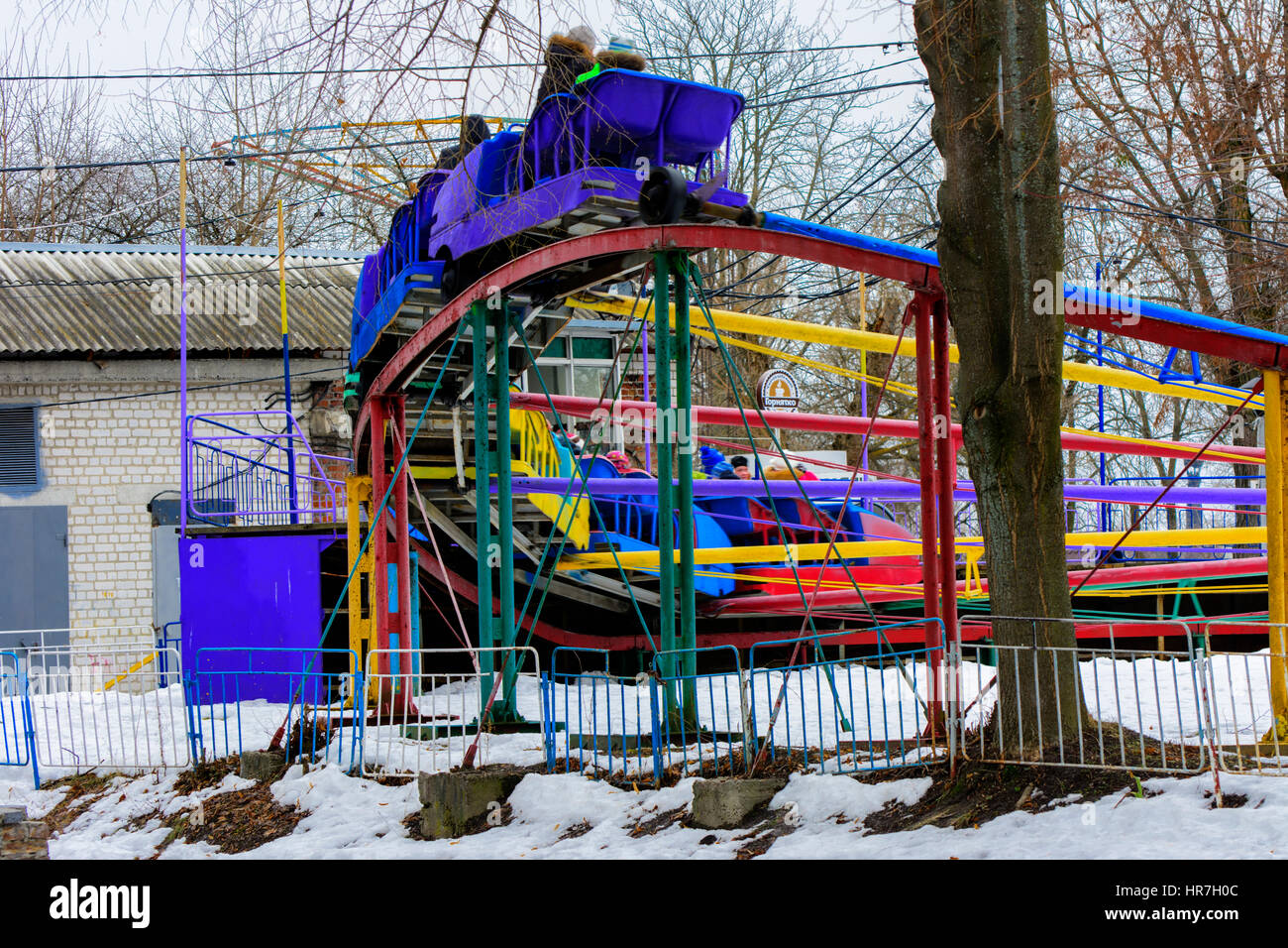 Children's playgrounds and children's rides in the winter on a holiday ...