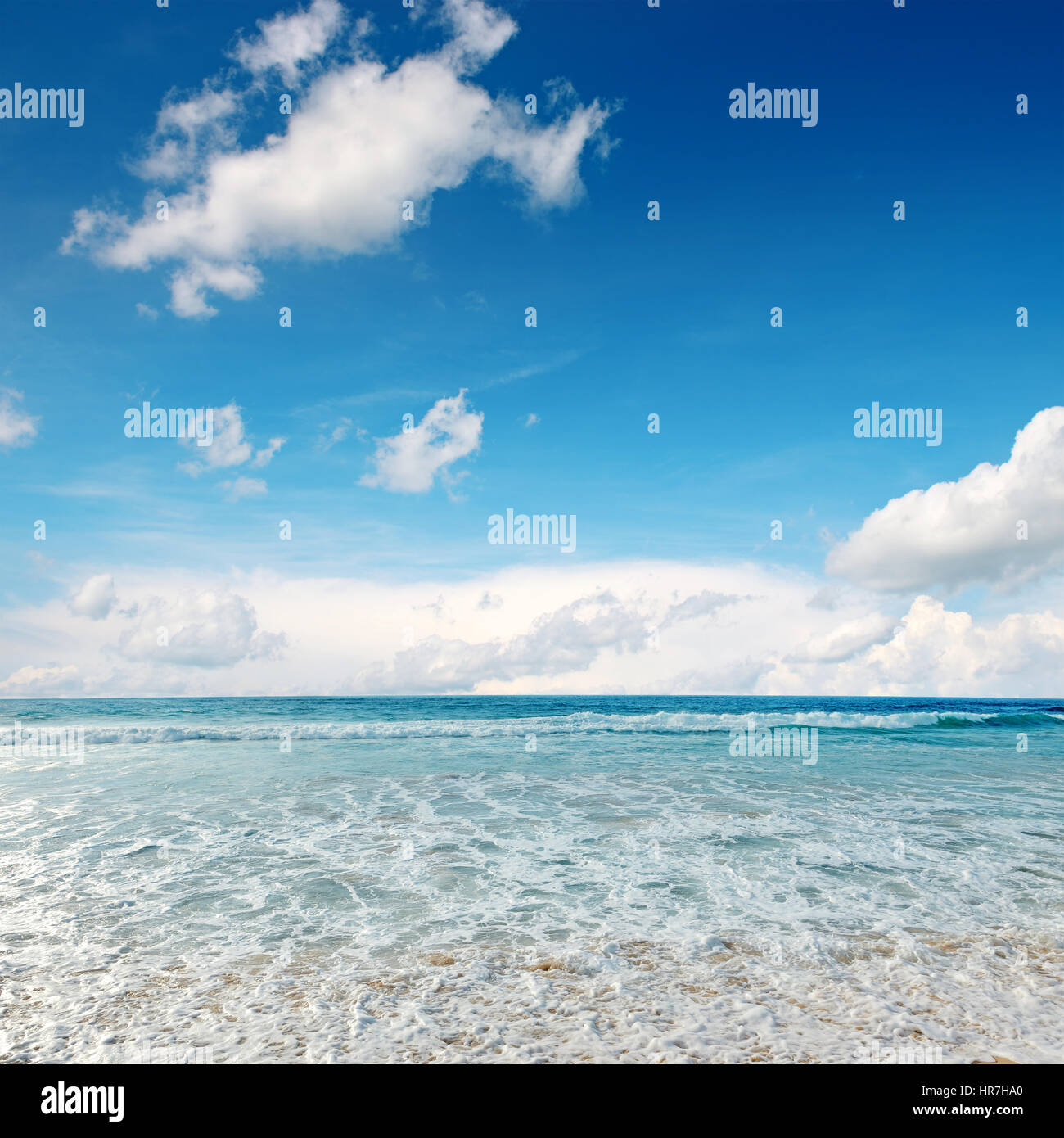 sea waves and blue sky Stock Photo - Alamy
