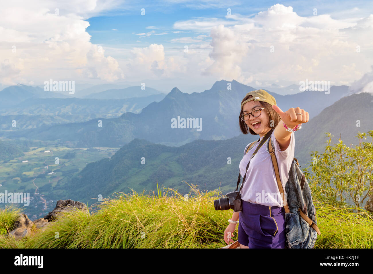 Happy hiker asian cute teen girl with dslr camera cap eyeglass and ...