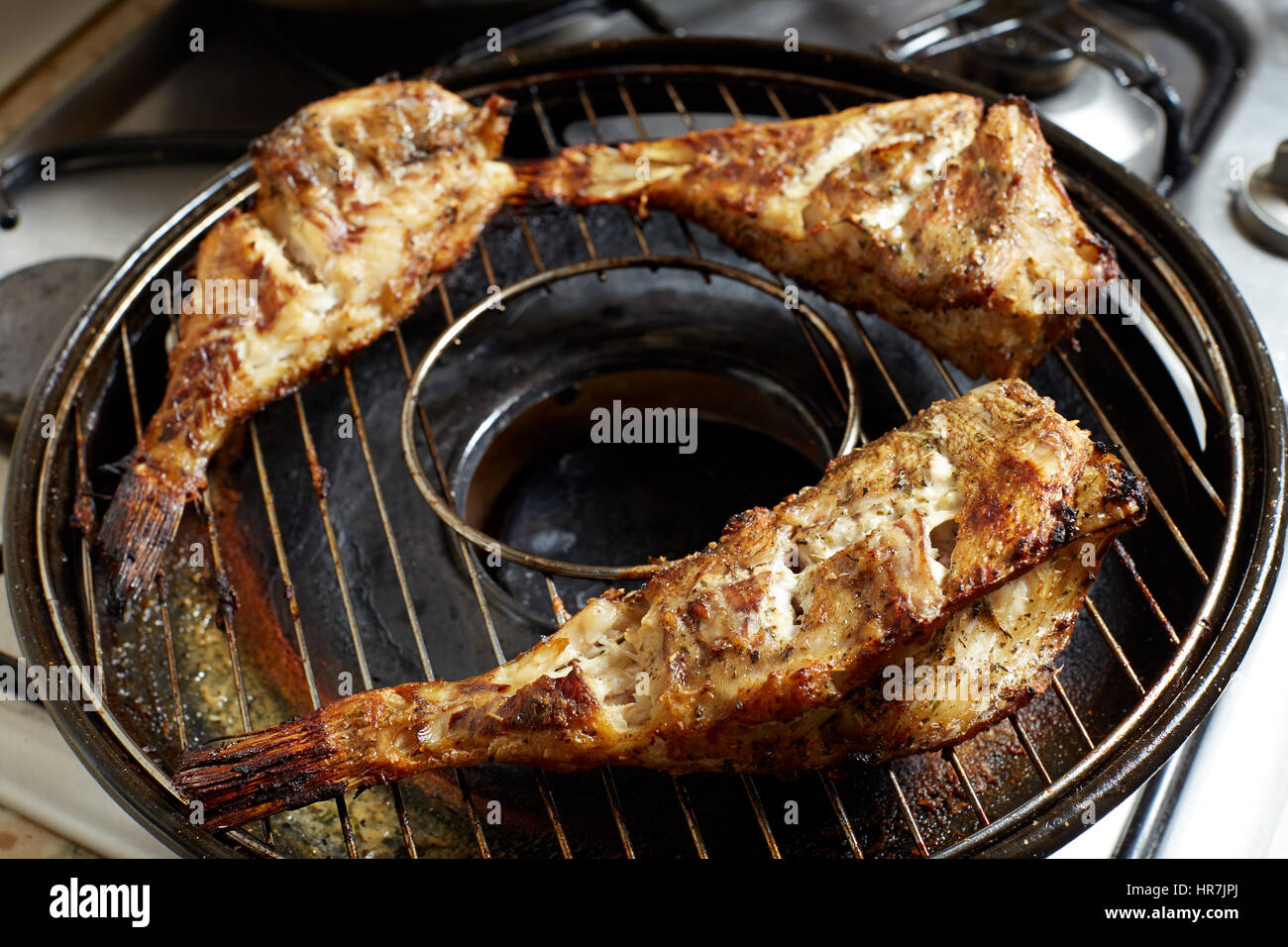 grilled fish on the grill. homemade healthy food Stock Photo - Alamy