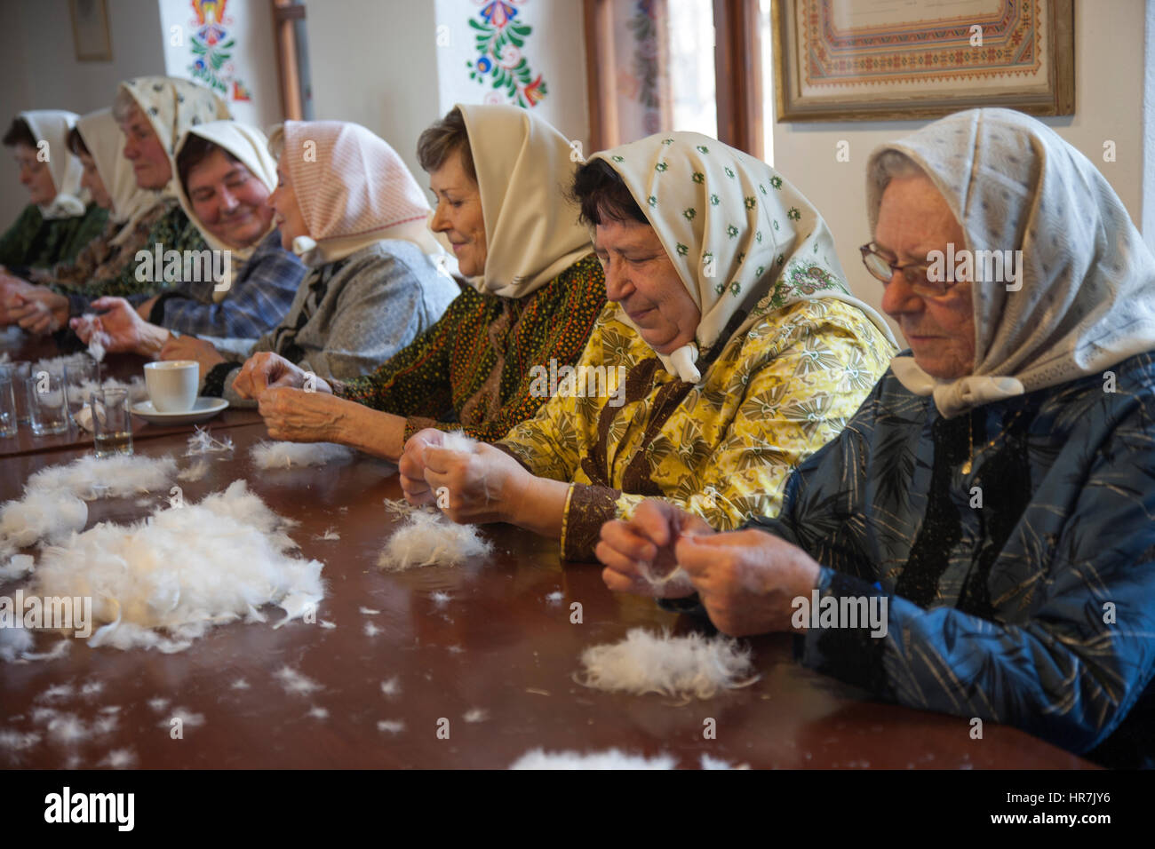 Women plucking goose down hi-res stock photography and images - Alamy