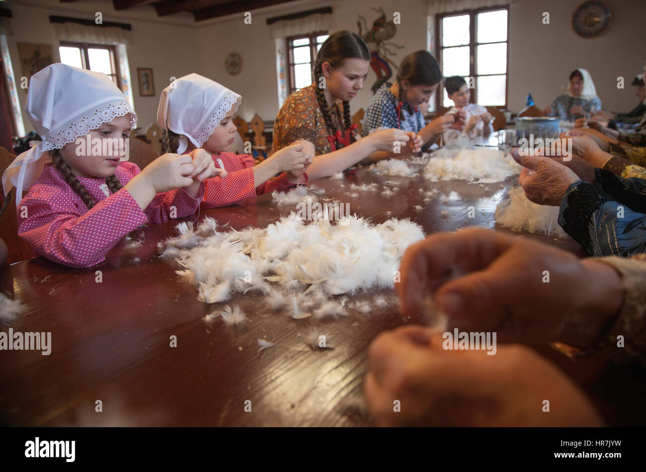 Women plucking goose down hi-res stock photography and images - Alamy