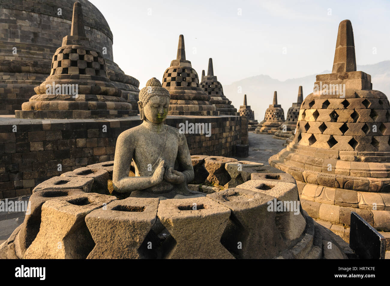 Statue of Budha in the famous temple of Borobudur Stock Photo - Alamy