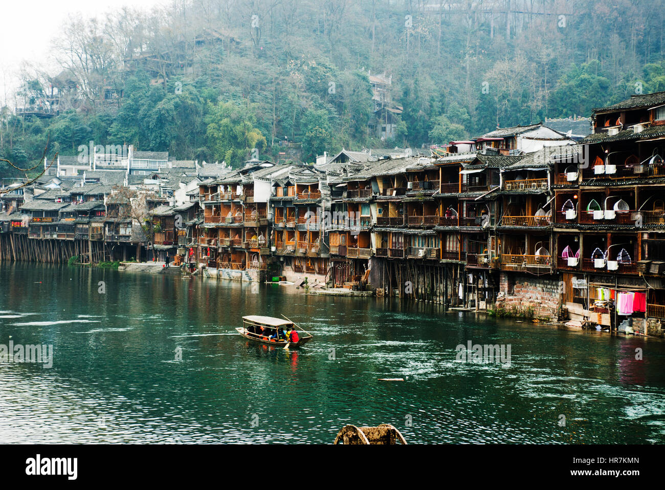 Fenghuang Ancient City streets at night.In tuojiang river on both sides ...