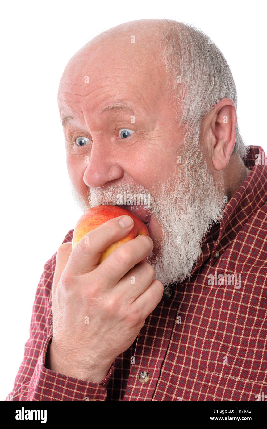 Older man eating apple hi-res stock photography and images - Alamy