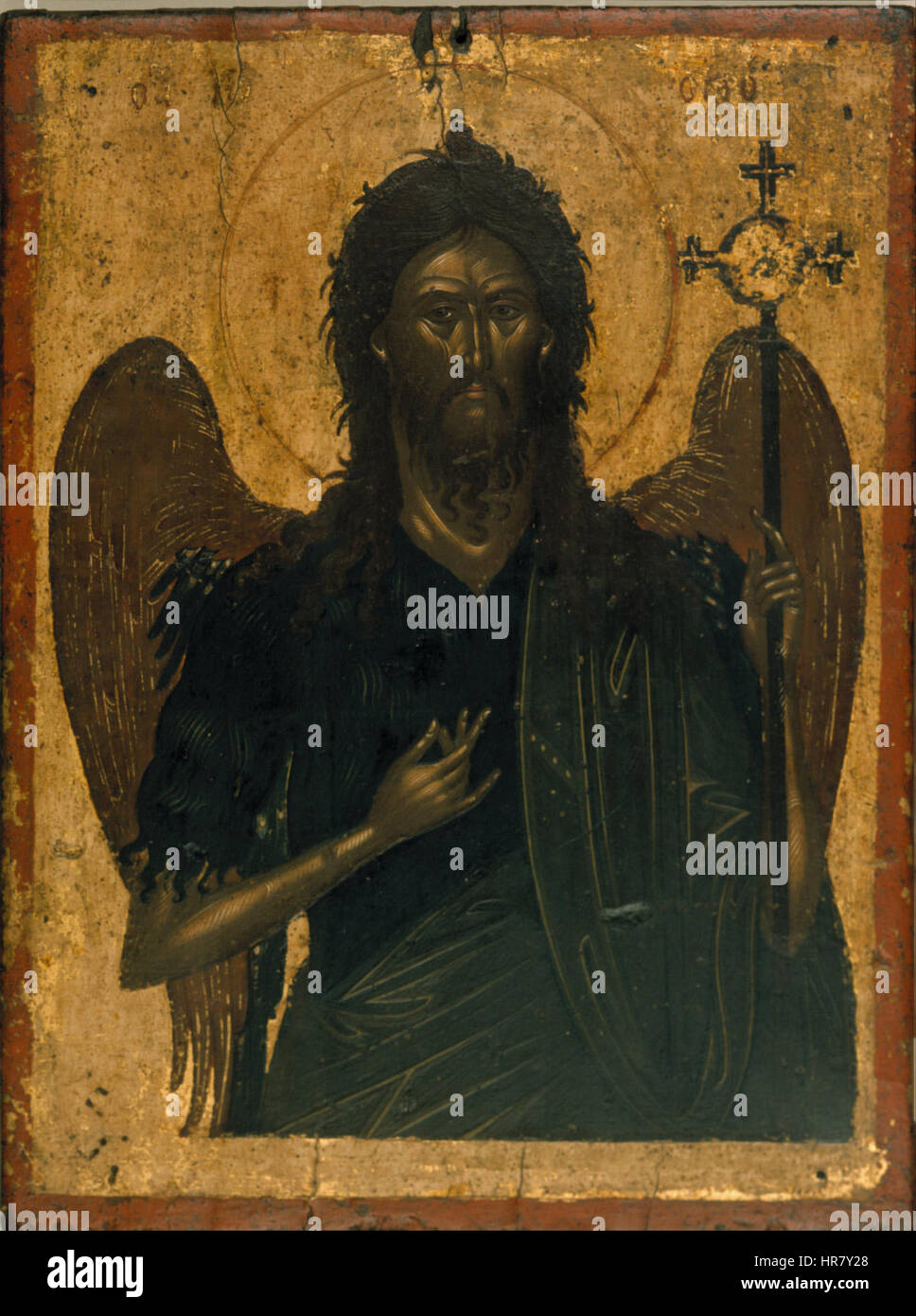 *St. John the Baptist*, a religious painting, depicts the saint in his ...