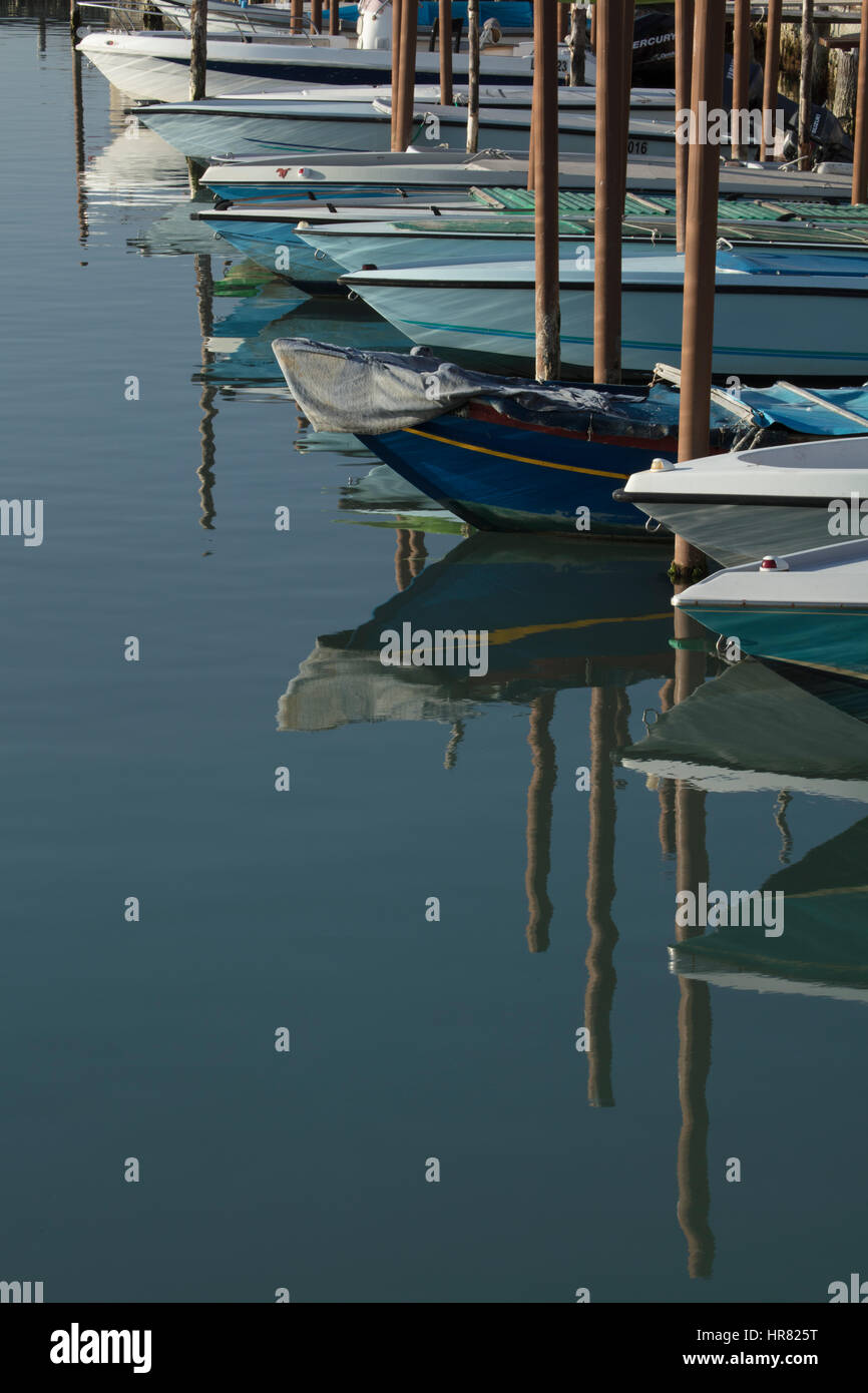 Reflections of boats in Burano, Venice Stock Photo - Alamy