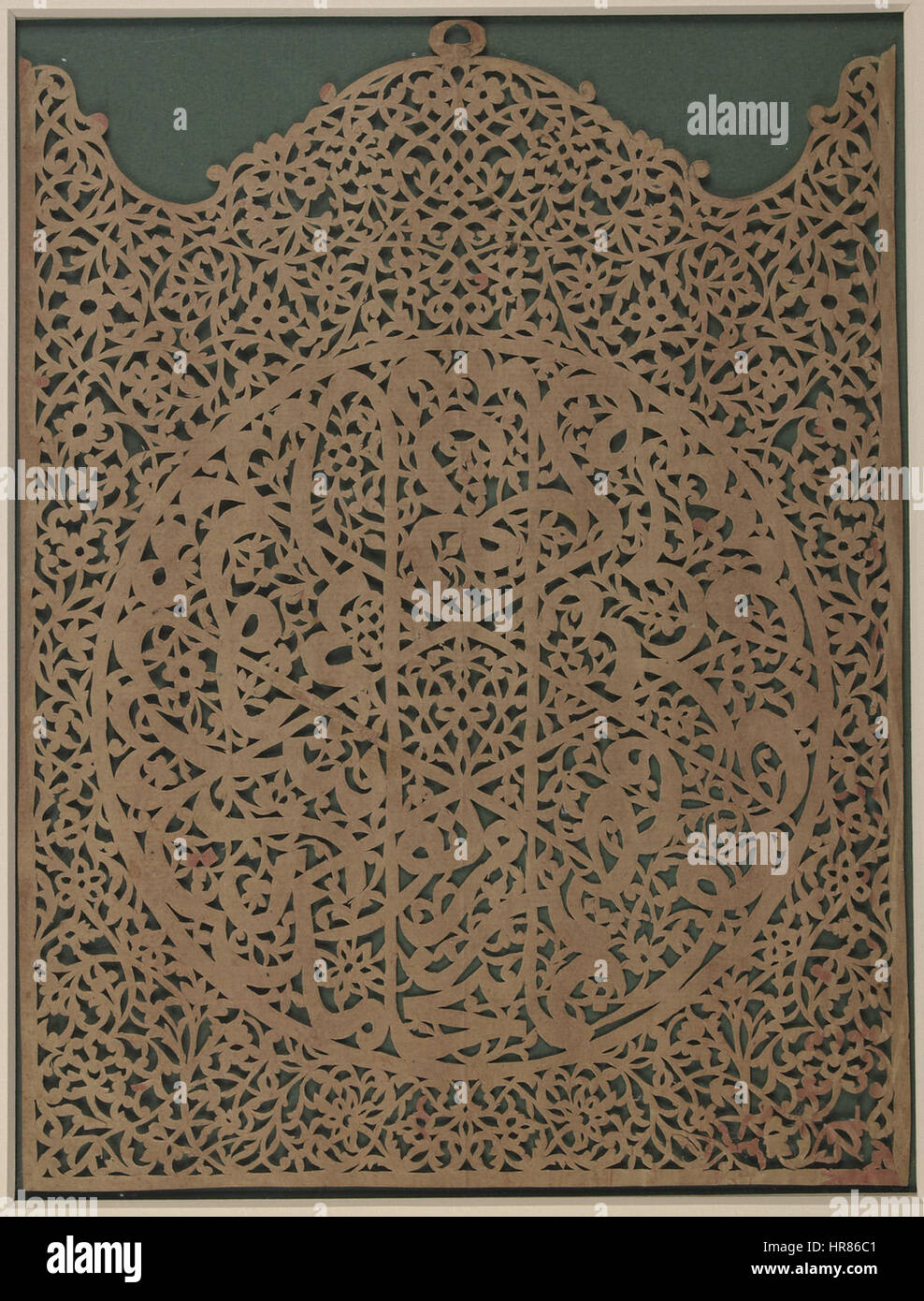 This wall hanging is a textile piece that likely represents traditional ...