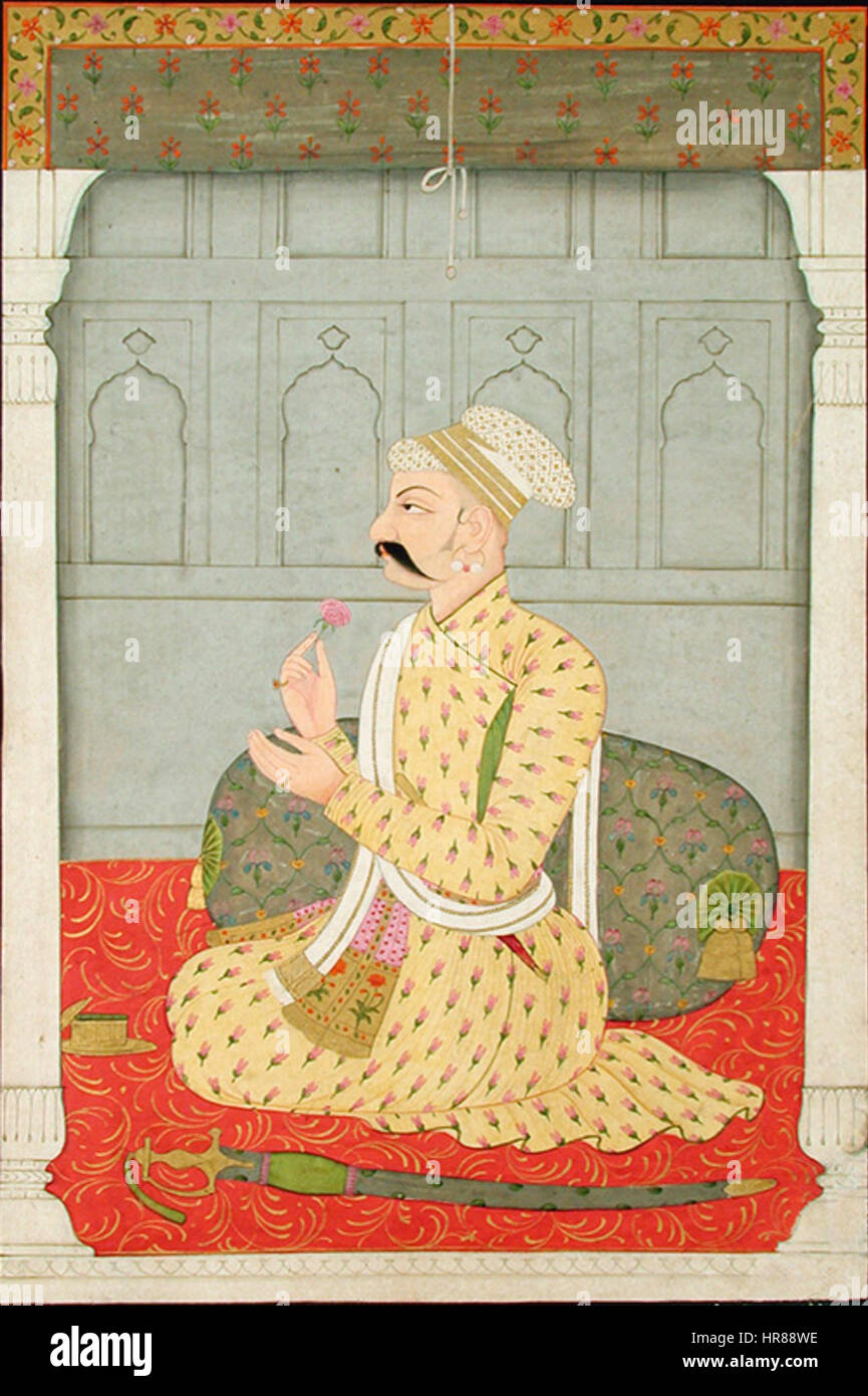 Vasudev-ji, kneeling against a bolster (6124588971 Stock Photo - Alamy