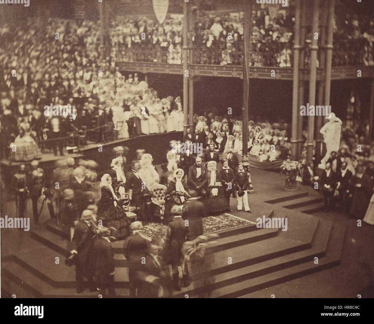 This historic image shows the Queen attending the Manchester Exhibition ...
