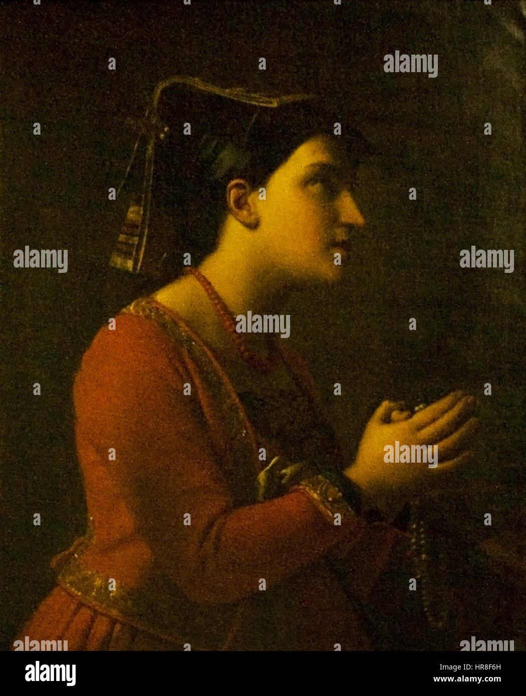 Young Italian lady praying Stock Photo - Alamy