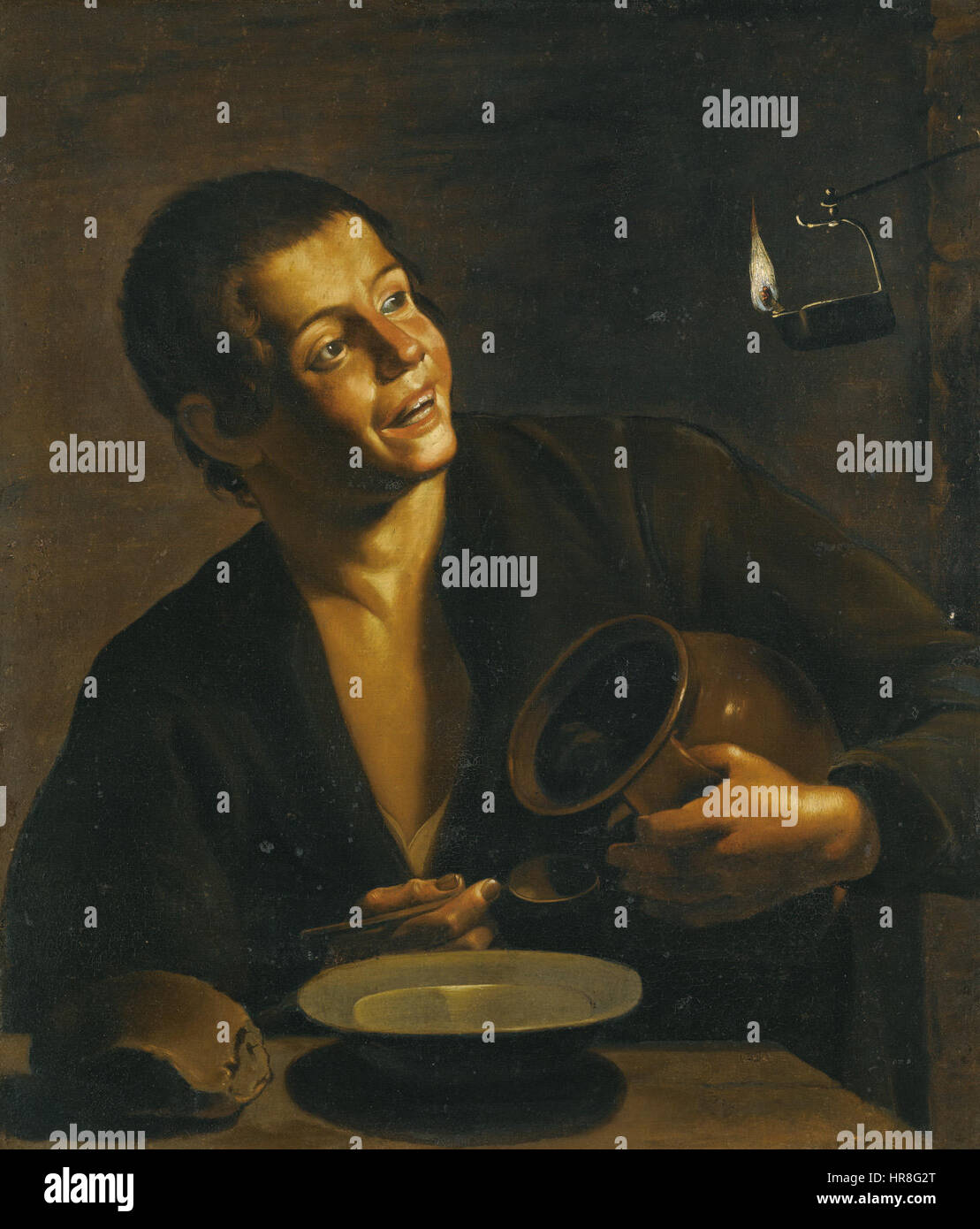 Spanish School - A young man eating by the light of an oil lamp Stock ...