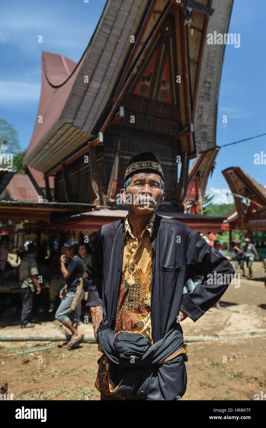 During a traditional ritual funeral of the Tana Toraja, everyone ...
