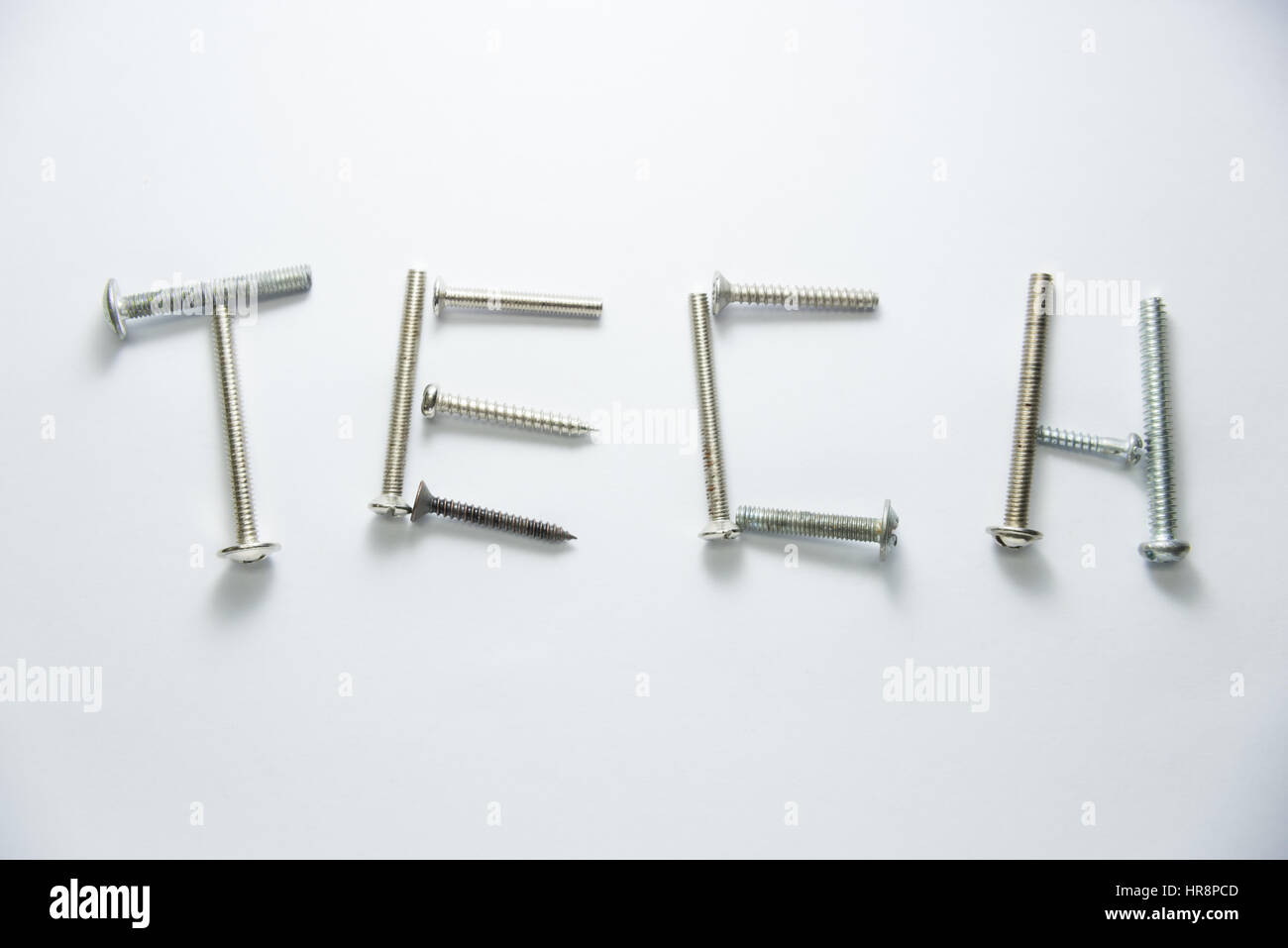 Word "Tech" made by screw Stock Photo - Alamy