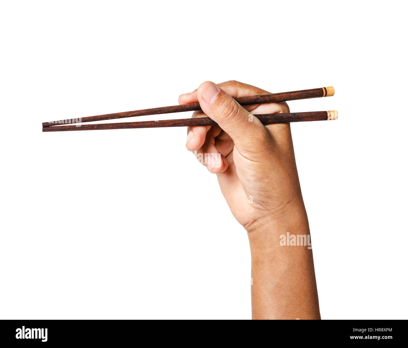 Person 's right hand using bamboo chopsticks isolated on white ...