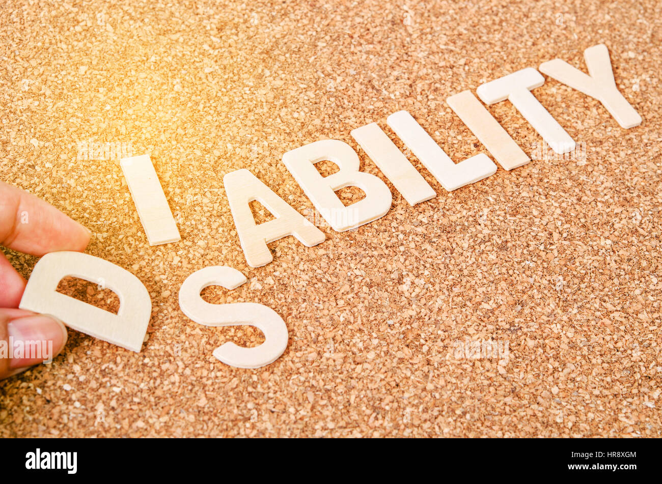 Hand arrange wood letters word Disability for Ability Stock Photo - Alamy