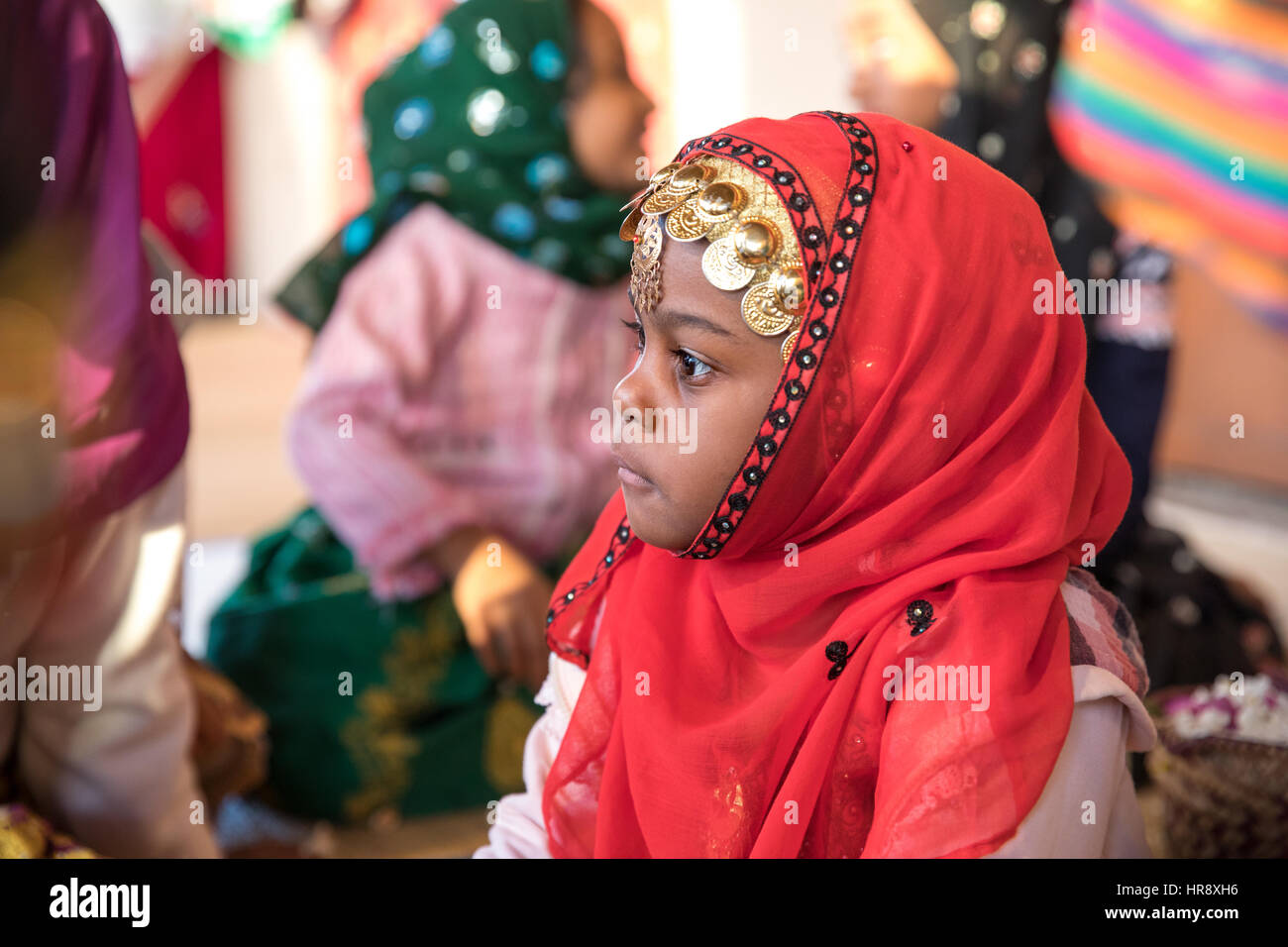 Muscat, Oman - Feb 4, 2017: Young Omani girl during a traditional ...