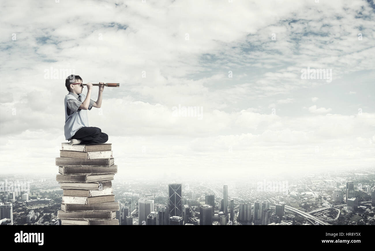 Reading for getting knowledge Stock Photo - Alamy