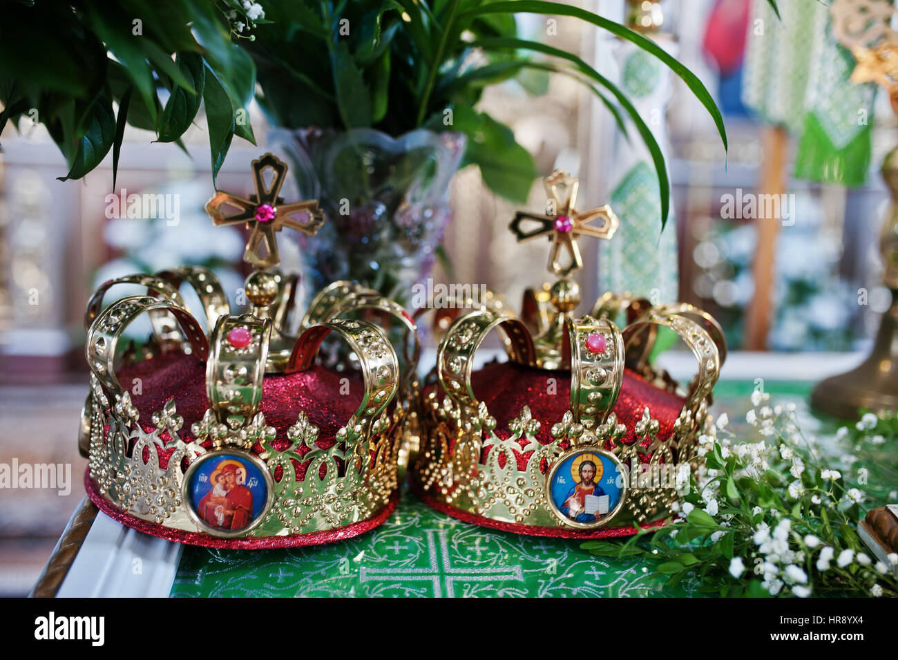 Two golden crowns for wedding ceremony at church Stock Photo - Alamy