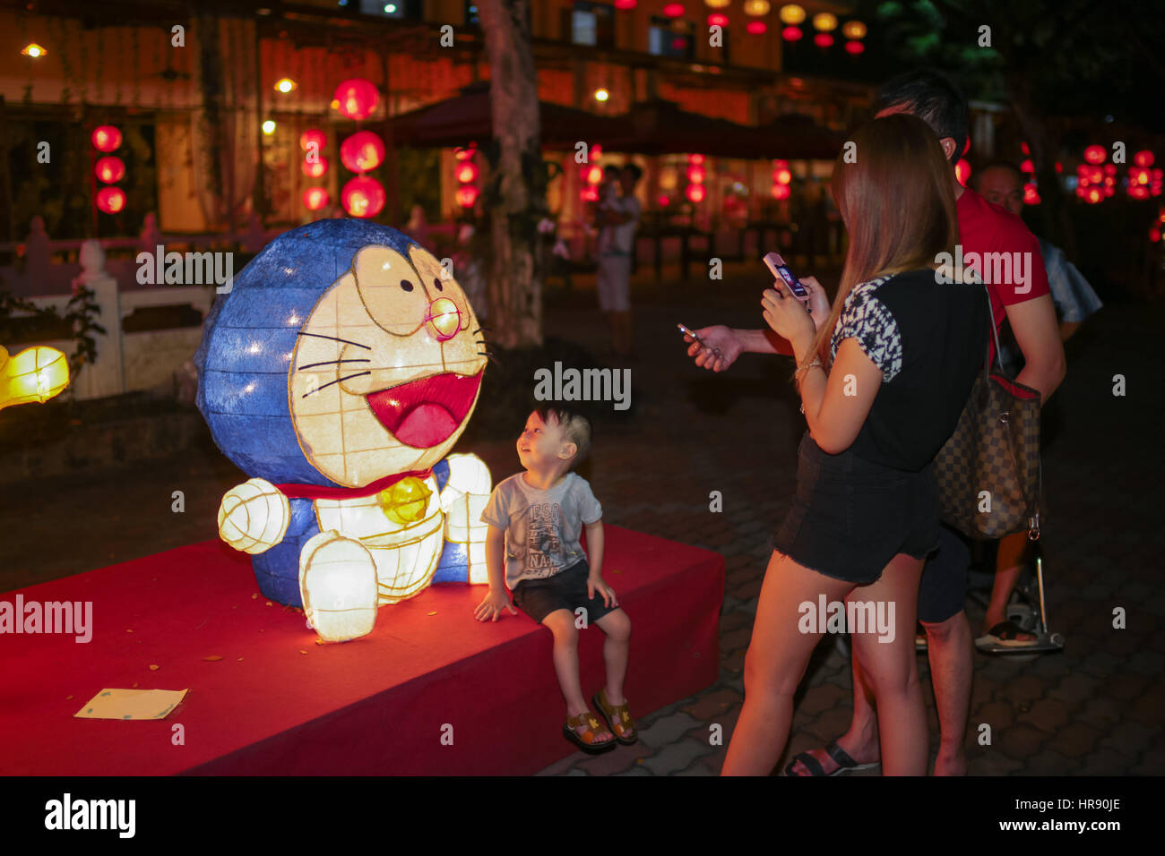 Family taking photo with LED light replica Doraemon at Fo Guang Shan ...