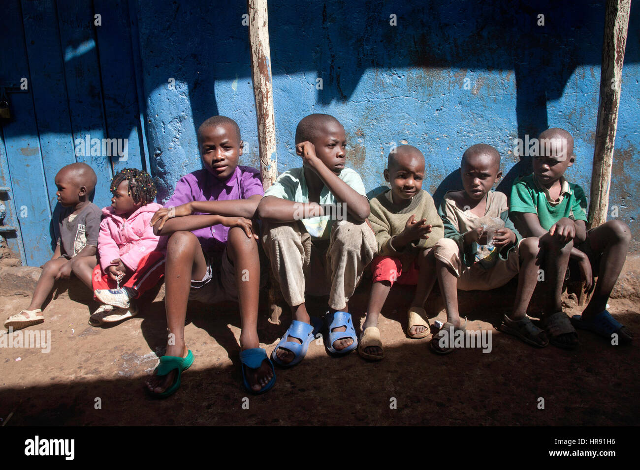 Orphans sitting outside orphanage, Kibera slum, Nairobi, Kenya, East ...