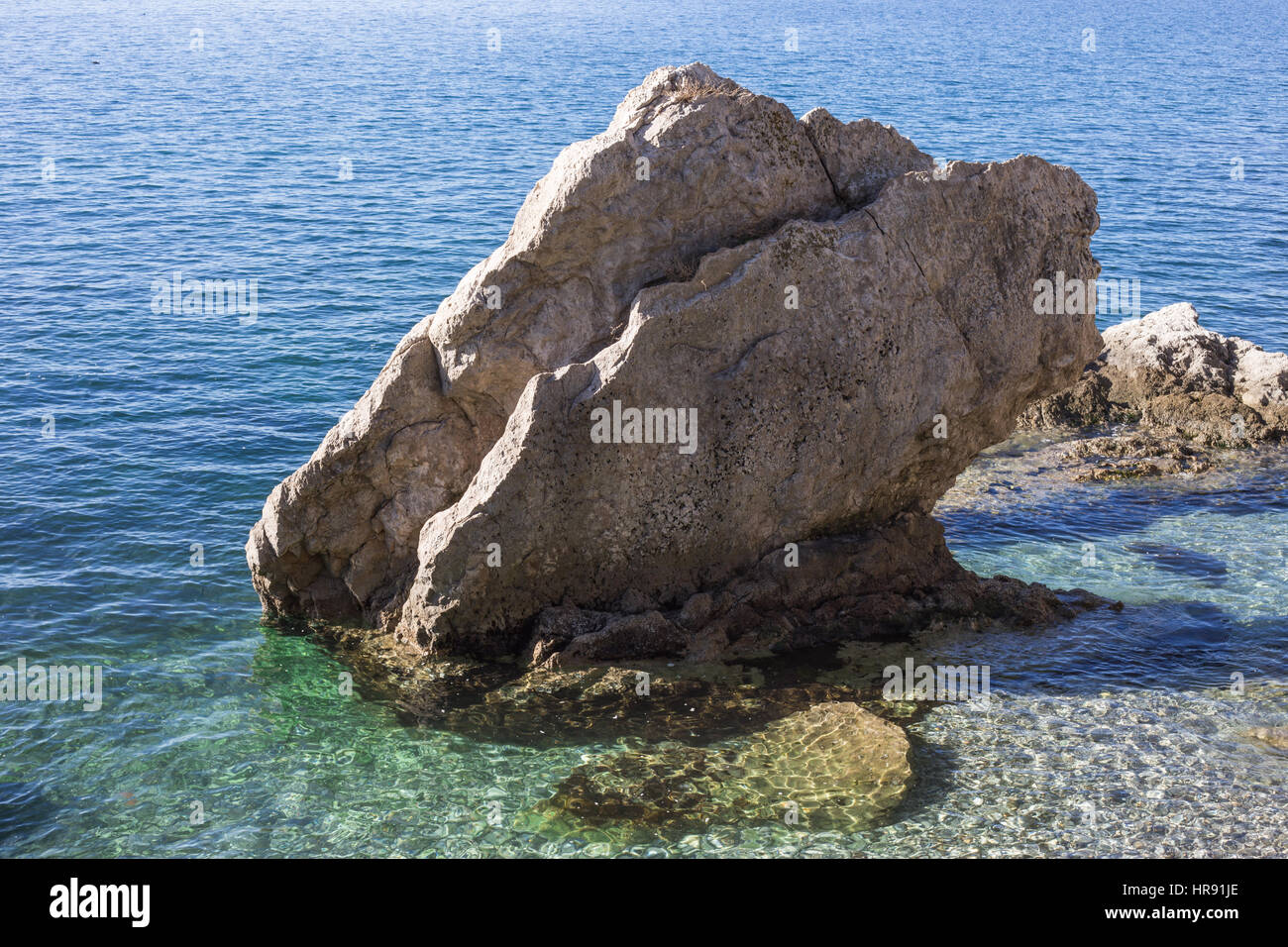 Rock in the sea Stock Photo - Alamy