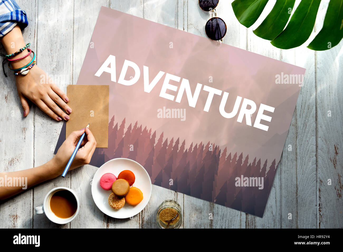 Adventure word on nature background with trees Stock Photo - Alamy