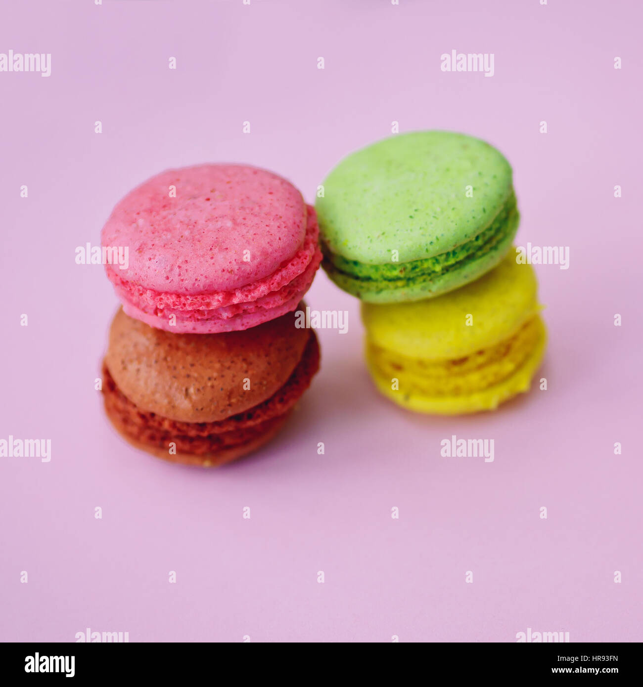 colorful macaroons on the pink background Stock Photo - Alamy