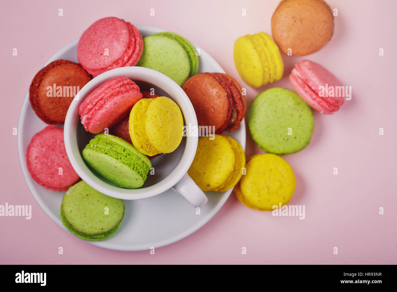 colorful macaroons on the pink background Stock Photo - Alamy